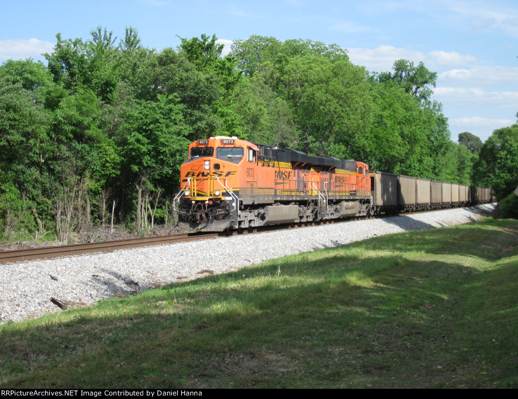 BNSF 6073 leads another empty coal train